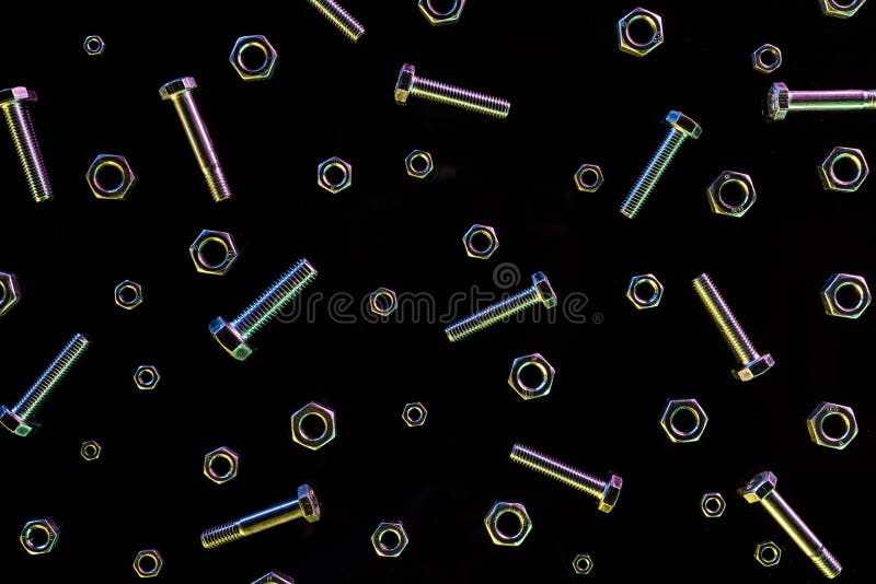 Top View of Metal Nuts and Bolts Pattern Isolated on Black. Stock Image ...