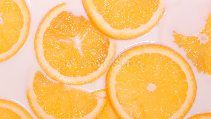 TOP VIEW: Milk Fills an Orange Slices Stock Photo - Image of ingredient ...
