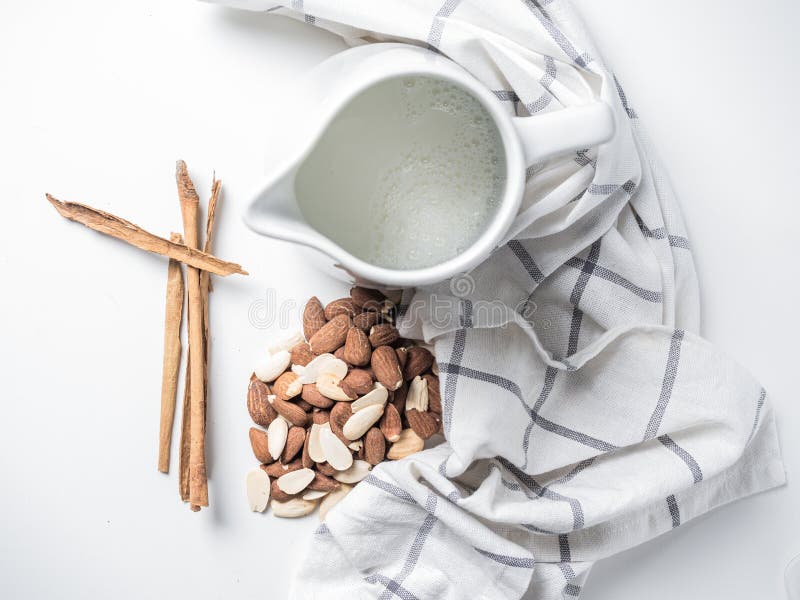 Top View of a Milk Jug and Almonds Decorated with a Piece of Fabric ...