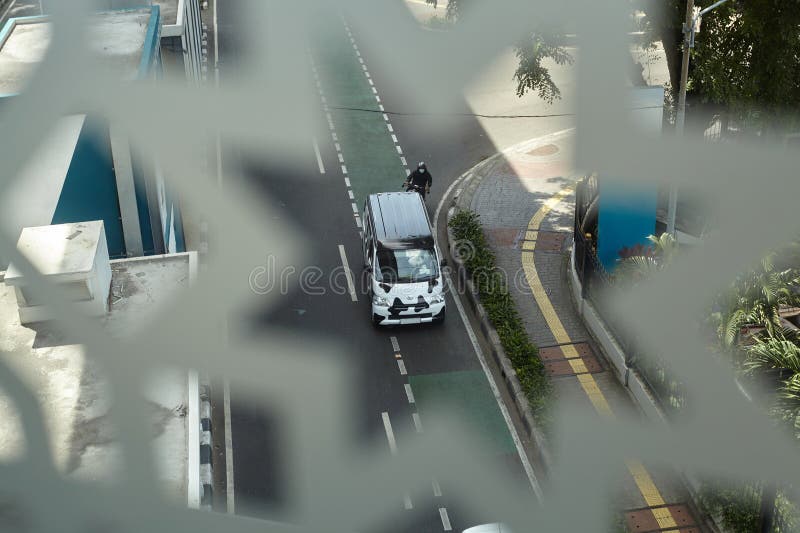 Top View of a Minibus Driving on the Road with Framing Composition ...