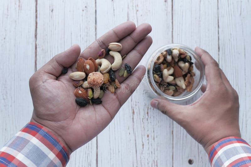 Top View of Mixed Nut on Man Hand Stock Image - Image of diverse, hand ...