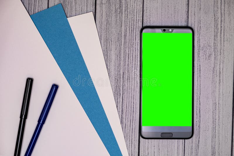 Top View of Mobile Phone with Paper and Felt-tip Pens. Cell Phone ...