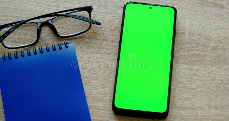 Top View of a Mobile Phone with a Vertical Layout of a Chromakey Green ...