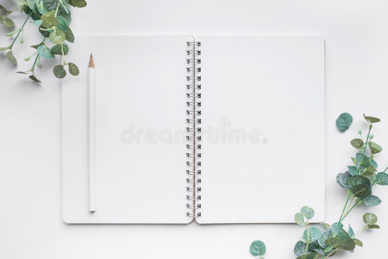 Top View of Mockup Notepad and Accessories in White Background. Stock ...