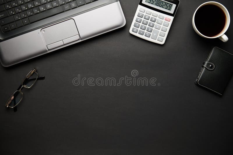 Top View of Modern Black Office Desk with Laptop, Notebook, Pencil and ...