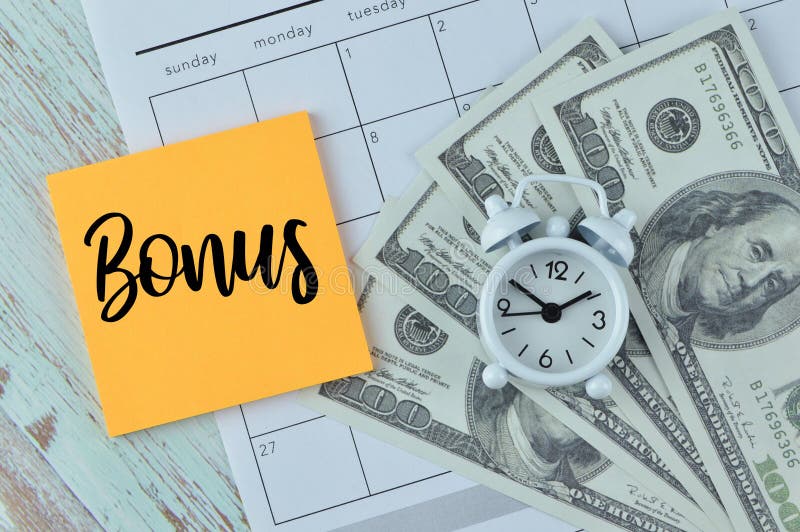 Top View of Money Banknotes, Clock and Memo Note Written with BONUS ...