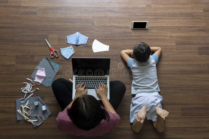 Top View Mother And Child Using Laptop Computer Make A Mask Work From ...