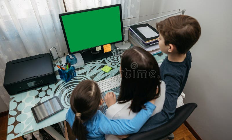 Mother and Children Looking at Computer Screen Stock Image - Image of ...