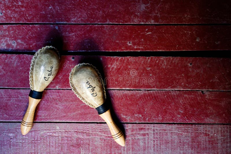 Top View of Music Shakers on a Red Wooden Surface Stock Image - Image ...