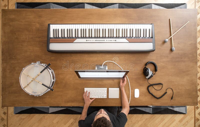 Top View of a Musician Creating Music in His Studio Working on Sound ...