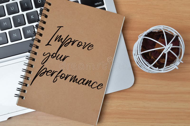 Top View of Notebook Written with Text IMPROVE YOUR PERFORMANCE Stock ...