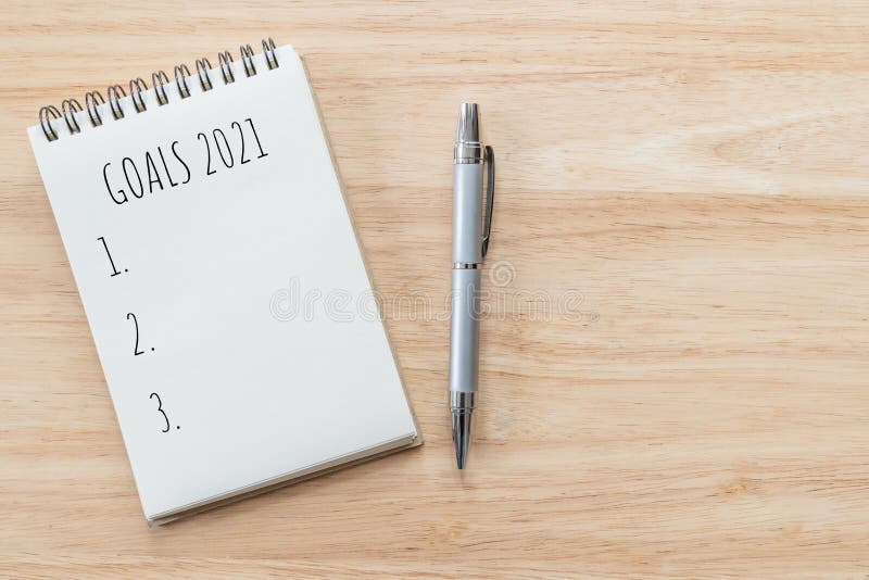 Top View of Notepad with Goals List on Wooden Table, Goals Concept ...