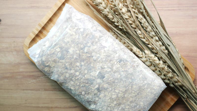 Top View of Oats Flakes in a Plastic Packet on Table Stock Video ...