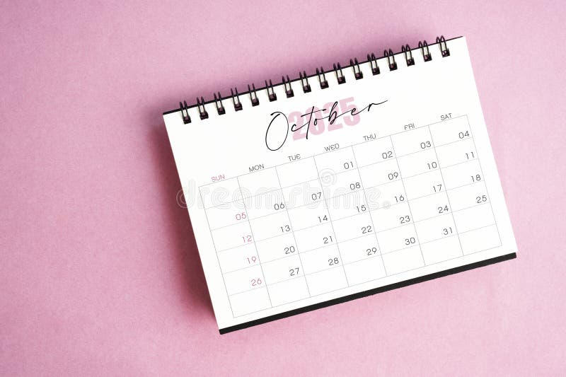 Top View of October 2025 Desk Calendar on Pink Background Stock Image ...