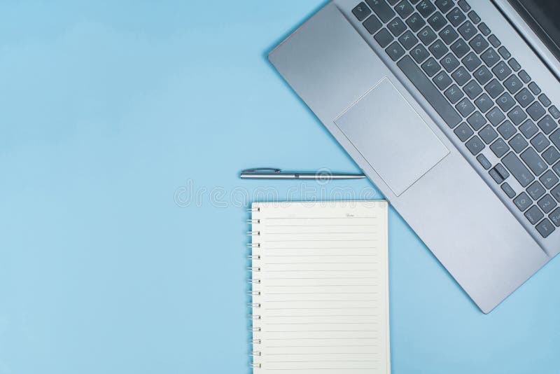 Top View of Office Table Top with Laptop Computer, Pen and Notebook ...