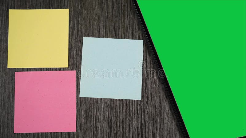 Top View Office Table with Sticky Notes and Green Tablet Screen. Blank ...