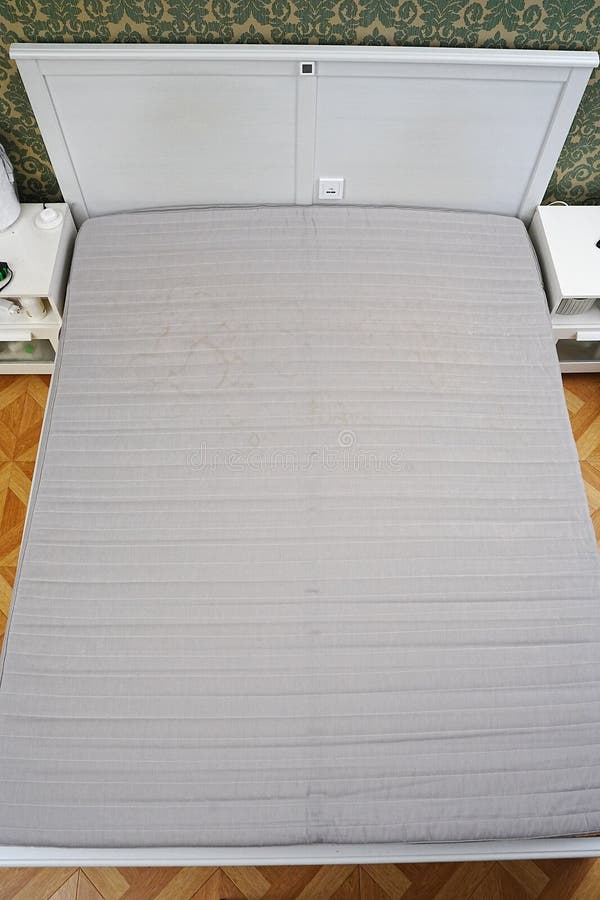 Top View of an Old Gray Spring Mattress on a White Wooden Bed. Stock ...
