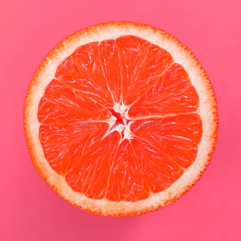 Top View of a One Grapefruit Slice on Bright Background in Light Pink ...