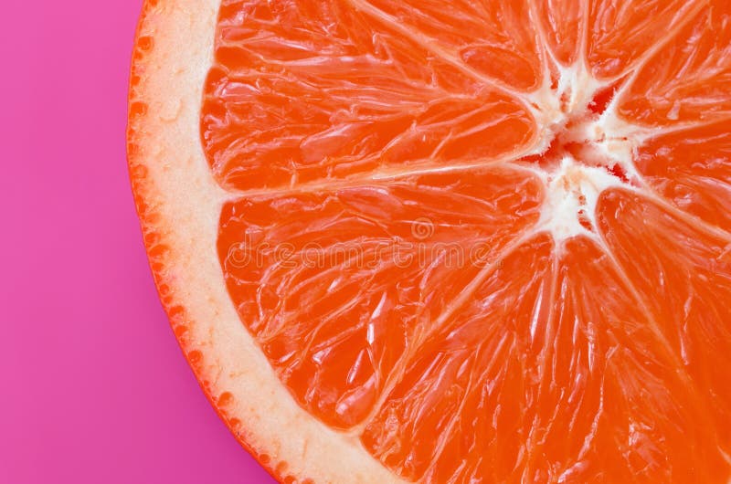 Top View of an One Grapefruit Slice on Bright Background in Purple ...