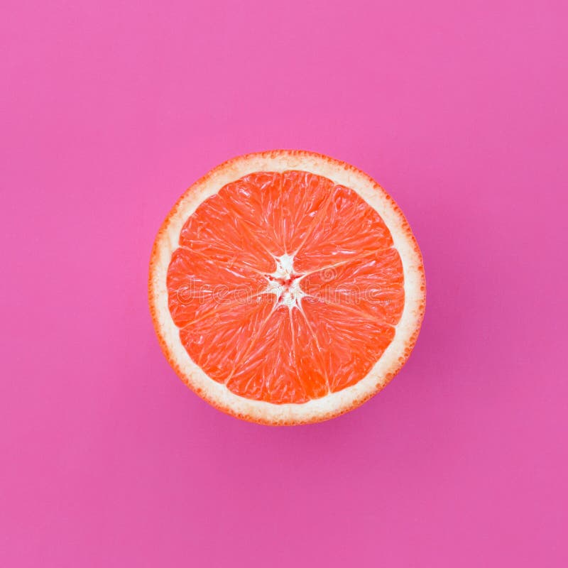 Top View of an One Grapefruit Slice on Bright Background in Purple ...