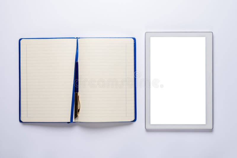 Top View of the Open Blank Notepad and Tablet with the White Screen To ...