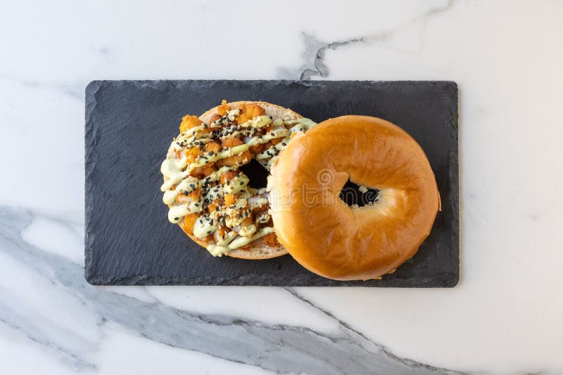 Top View of an Open Cut Bagel with Delicious Meat, Vegetables, and ...