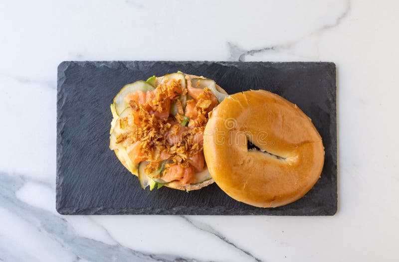 Top View of an Open Cut Bagel with Delicious Meat, Vegetables, and ...