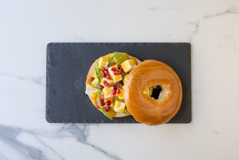 Top View of an Open Cut Bagel with Delicious Meat, Vegetables, and ...