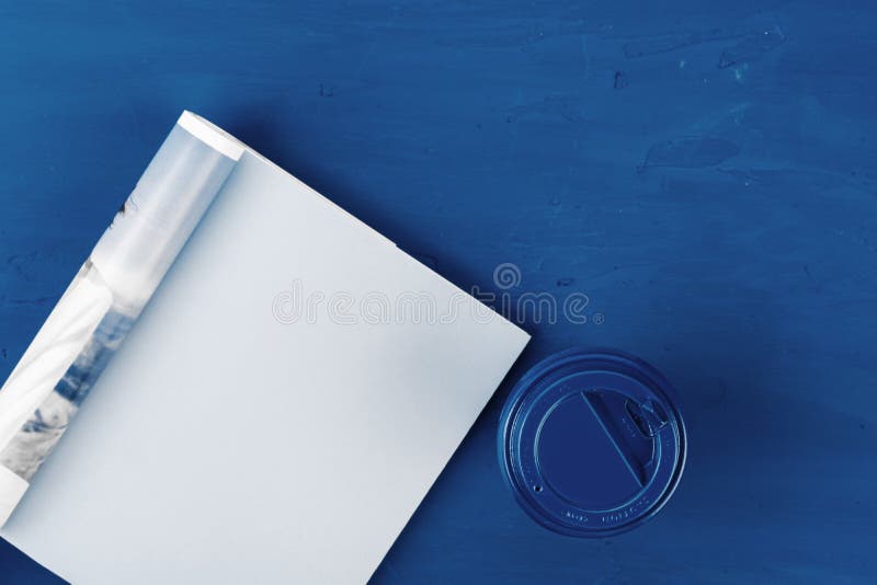 Top View of Open Magazine Page with Copy Space on Classic Blue ...