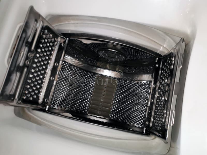 Top View of the Open Metal Drum of a White Washing Machine with ...