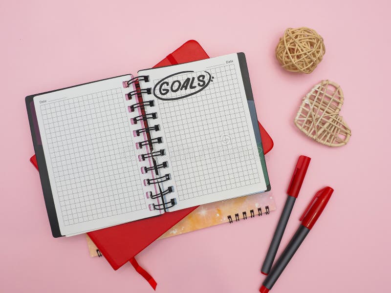 Top View of an Open Notebook with Blank Pages and Goal Inscription on ...