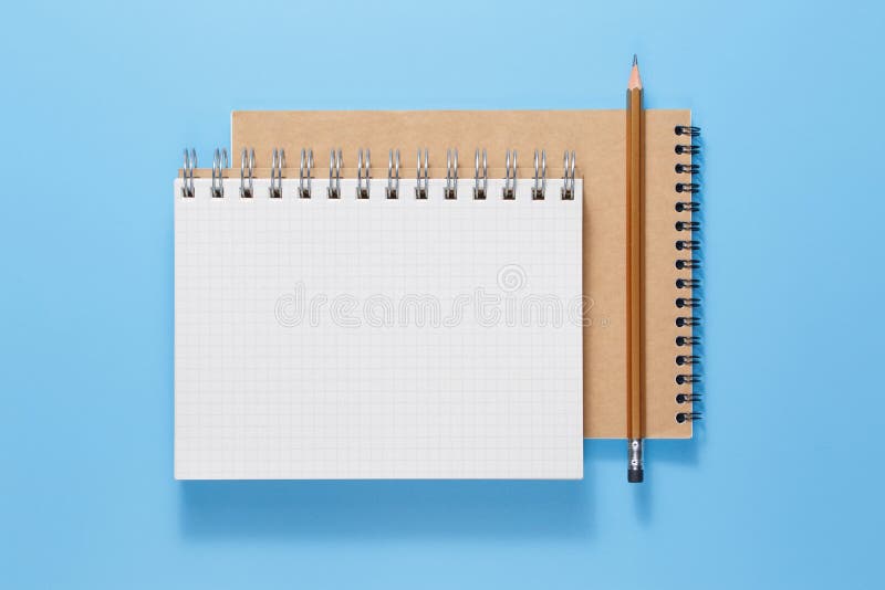 Top View of Open Notebook with Pencil on Blue Background Stock Image ...