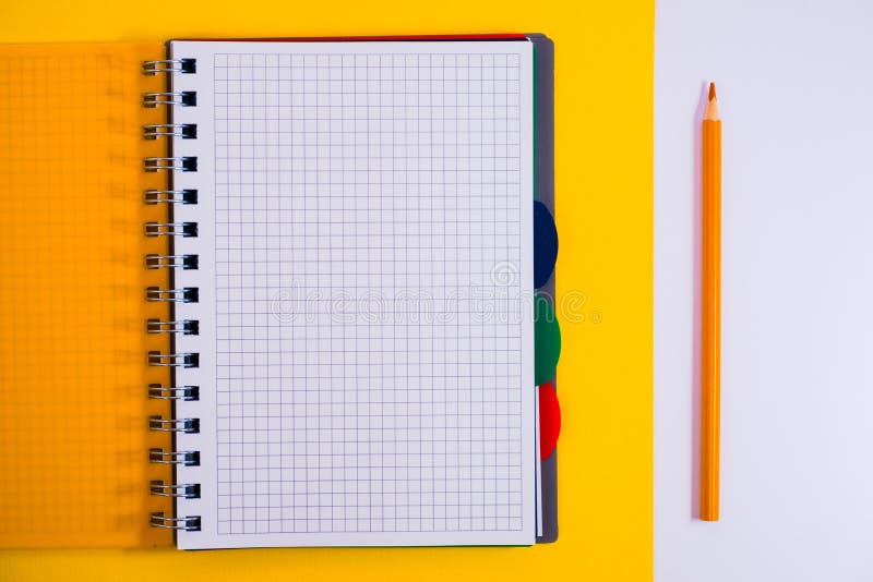 Top View of Open Spiral Blank Notebook with Pencil on Yellow Desk ...