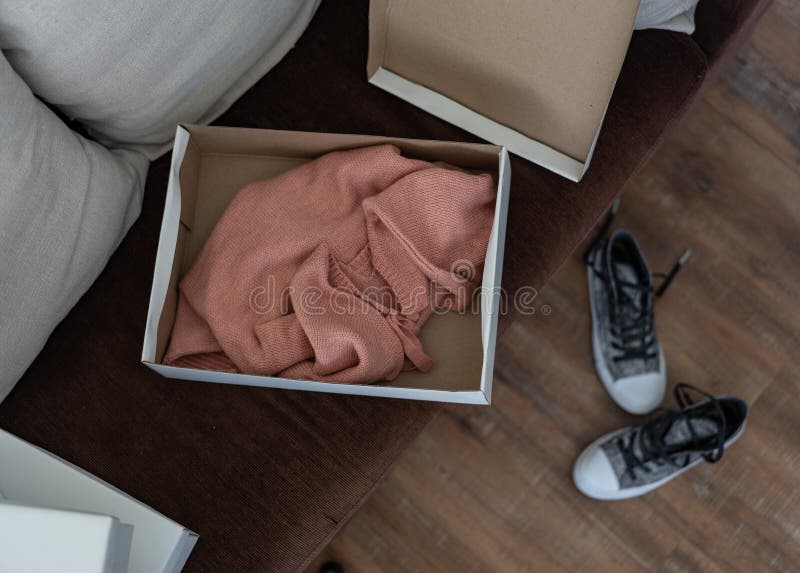 Top of View of an Open Gift Box on a Wooden Floor with Others Boxes ...