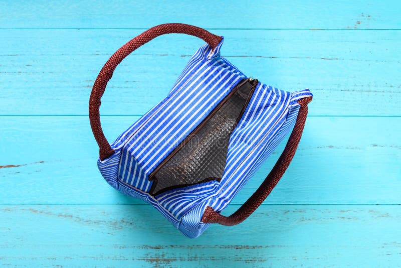 Opened Blue Lunch Pack Carrier or Insulation Bag on a Wood Table Stock ...