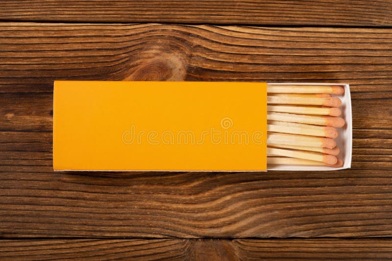 Orange Color Matchbox with Orange Match Sticks on a Wood Table Stock ...
