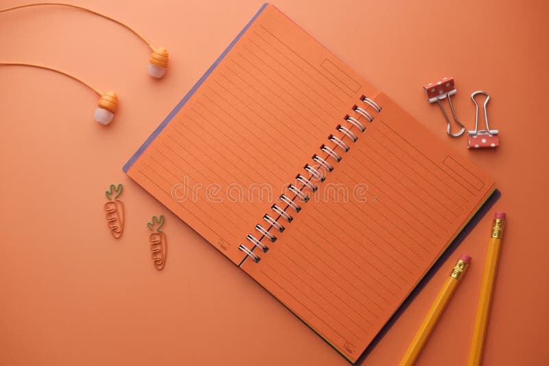 Top View of Orange Color Notepad and Pencil, Top View Stock Photo ...