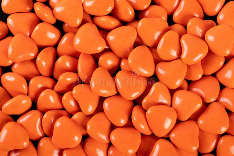 Top View of Orange Heart-shaped Candies in a Container Under the Lights ...