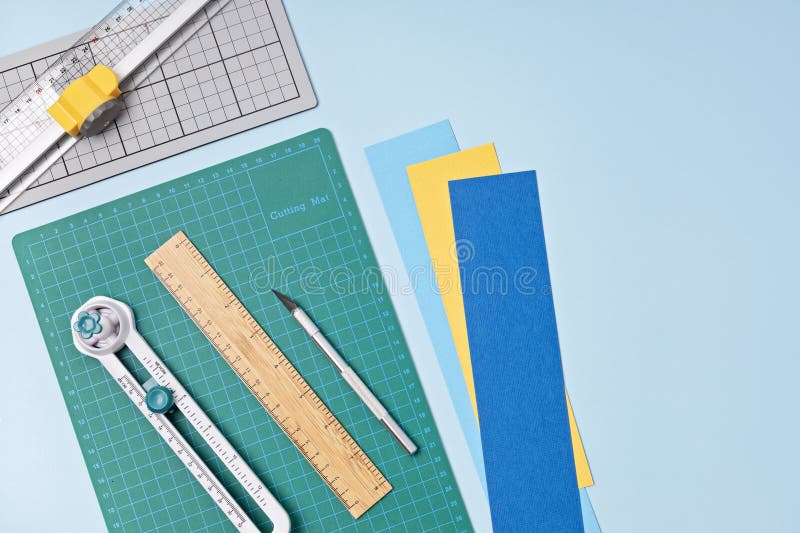 Top View Over Paper Cut Tools, Scissors, Cutter, Cutting Mat and Paper ...