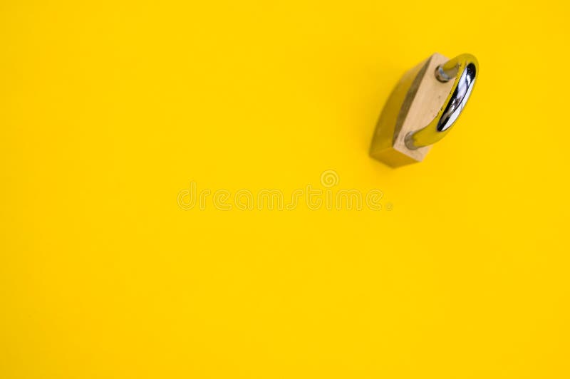Top View of a Padlock Isolated on Yellow Background Stock Photo - Image ...