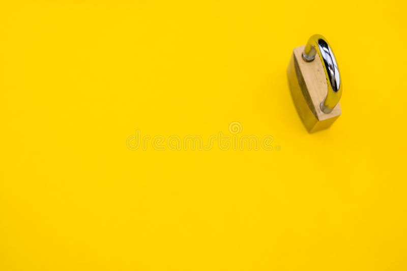 Top View of a Padlock Isolated on Yellow Background Stock Photo - Image ...