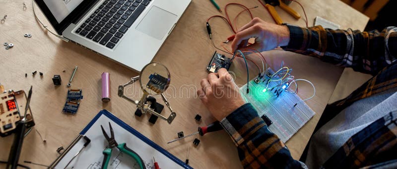 Top View of Partial Male Engineer Connecting Wires Stock Photo - Image ...