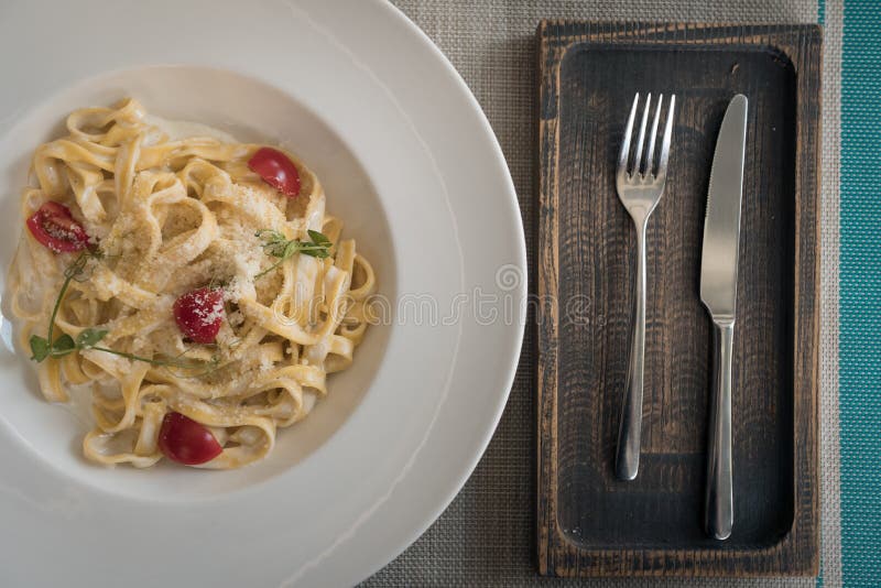 Top View of Pasta in Plate and with Spoon and Knife Stock Image - Image ...