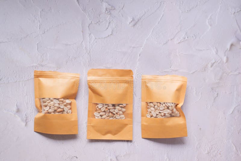 Top View of Peanut in a Take Away Paper Packet on Table Stock Photo ...