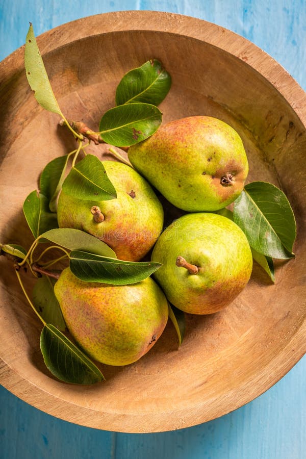 Top View of Pears in Brown Bowl on Blue Table Stock Image - Image of ...