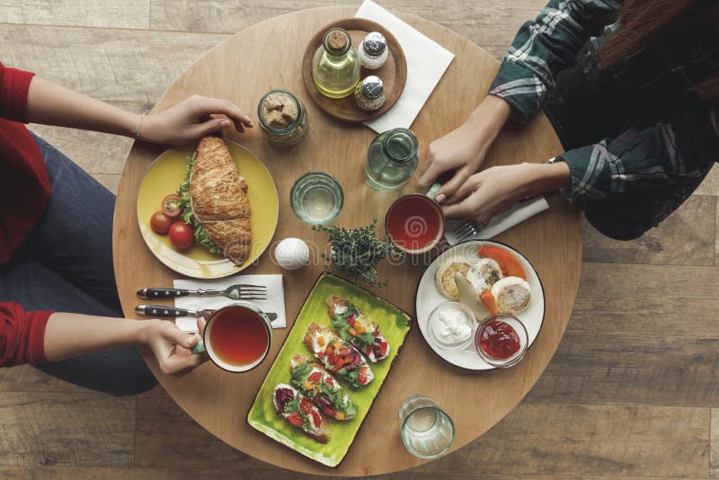 Top View of People Drinking Tea and Having Stock Photo - Image of hold ...