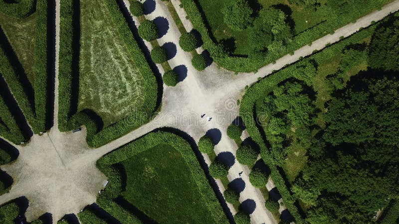 Top View of People Walking on Geometric Garden Paths. Creative Stock ...