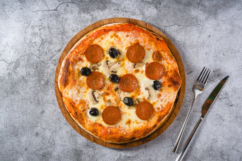 Top View of Pepperoni, Mushroom and Olive Neapolitan Pizza Stock Image ...