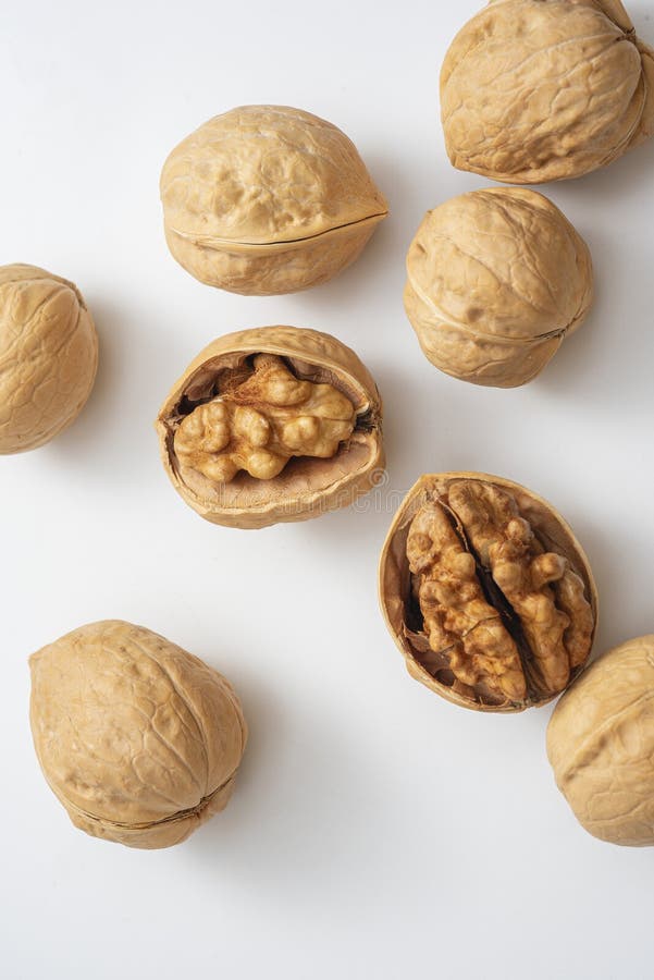 Top View Photo of Group Walnuts in Their Shells Stock Photo - Image of ...