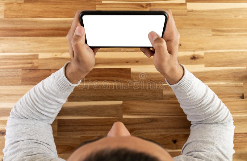 Top View Photo of Man Watching Video or Playing Mobile Game. Stock ...
